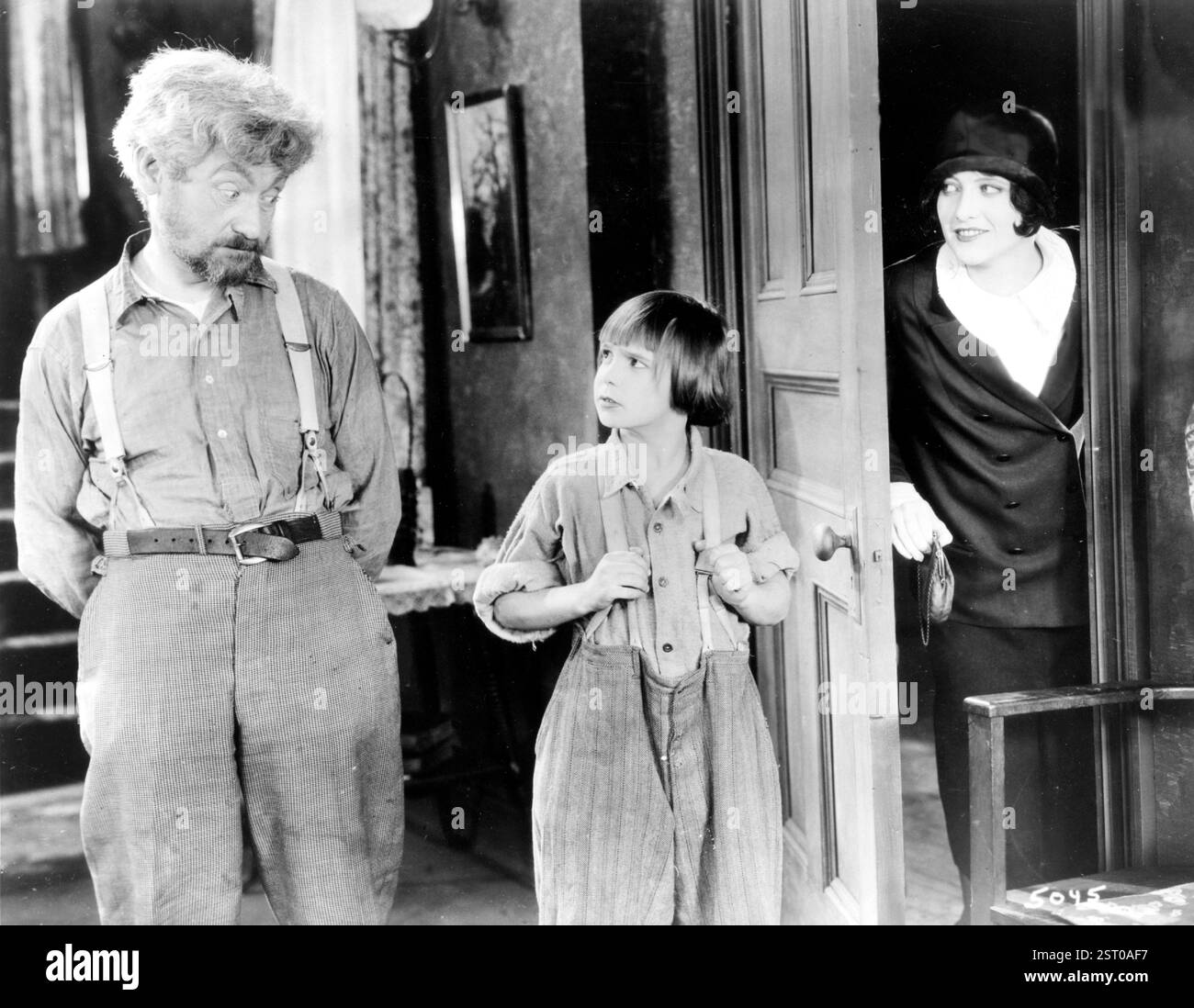 OLD CLOTHES [US 1925] [L-R] MAX DAVISDON, JACKIE COOGAN, JOAN CRAWFORD Date: 1925 Stock Photo ...