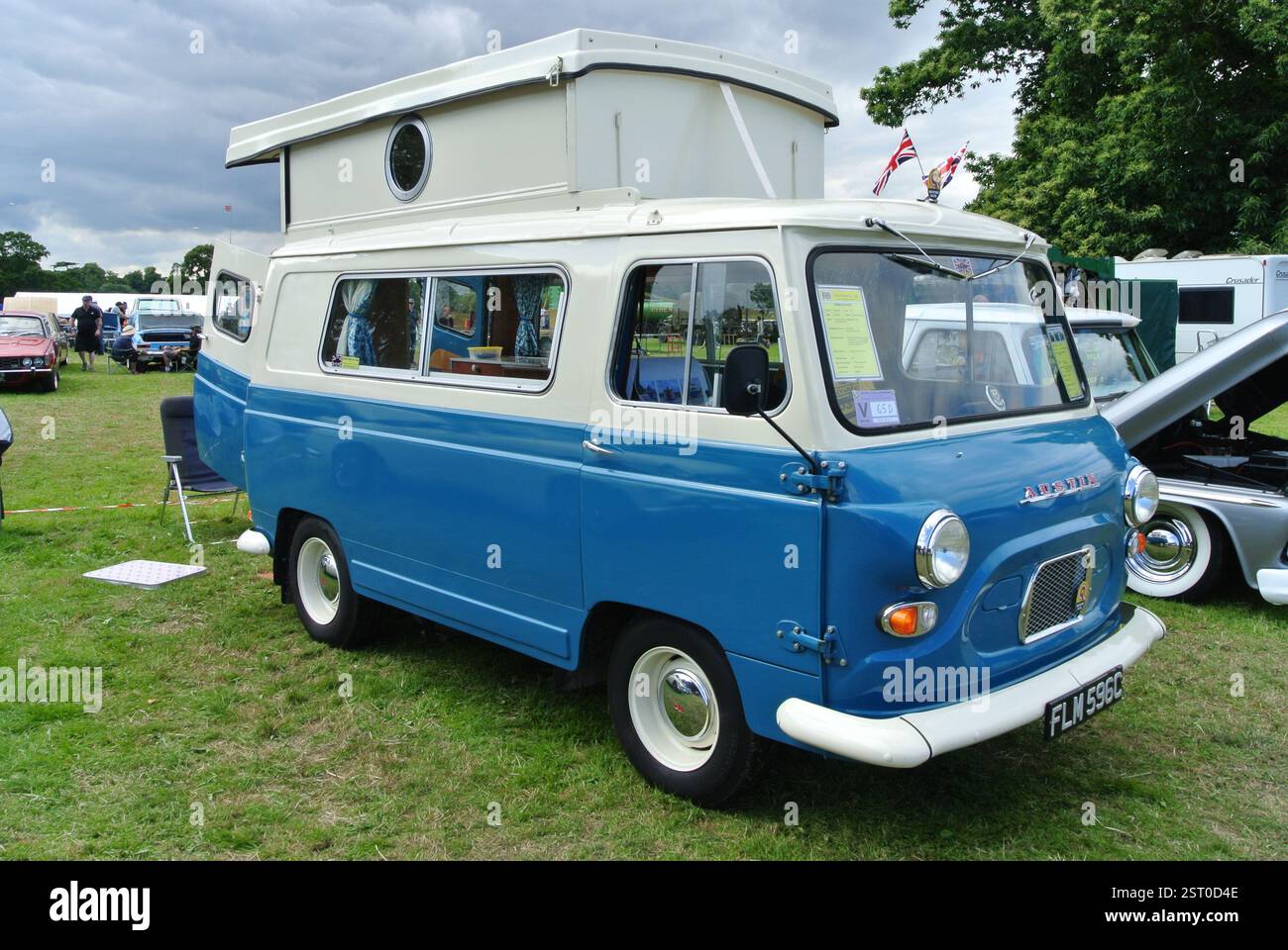 A 1965 Austin J4 camper van parked on display at the 49th Historic ...
