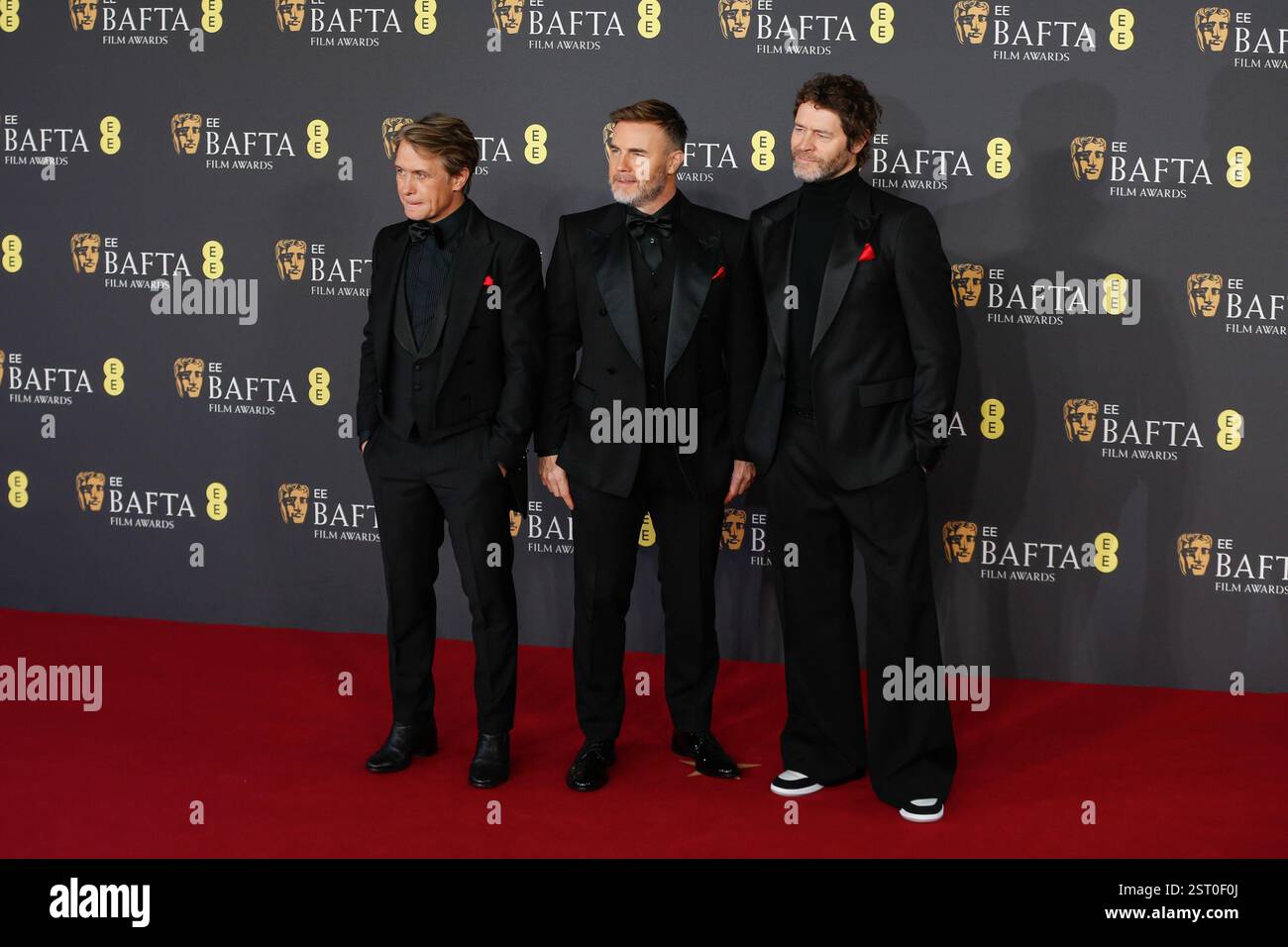 London, USA. 16th Feb, 2025. Mark Owen, Gary Barlow, and Howard Donald ...