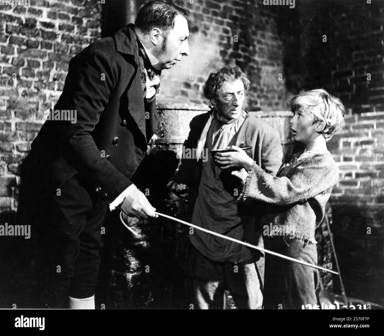 OLIVER TWIST [BR 1948] KENNETH DOWNEY as the workhouse master, JOHN ...