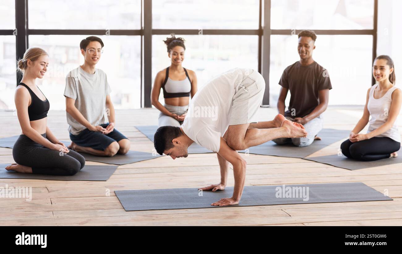 Female professional trainer teaching yoga hi-res stock photography and ...