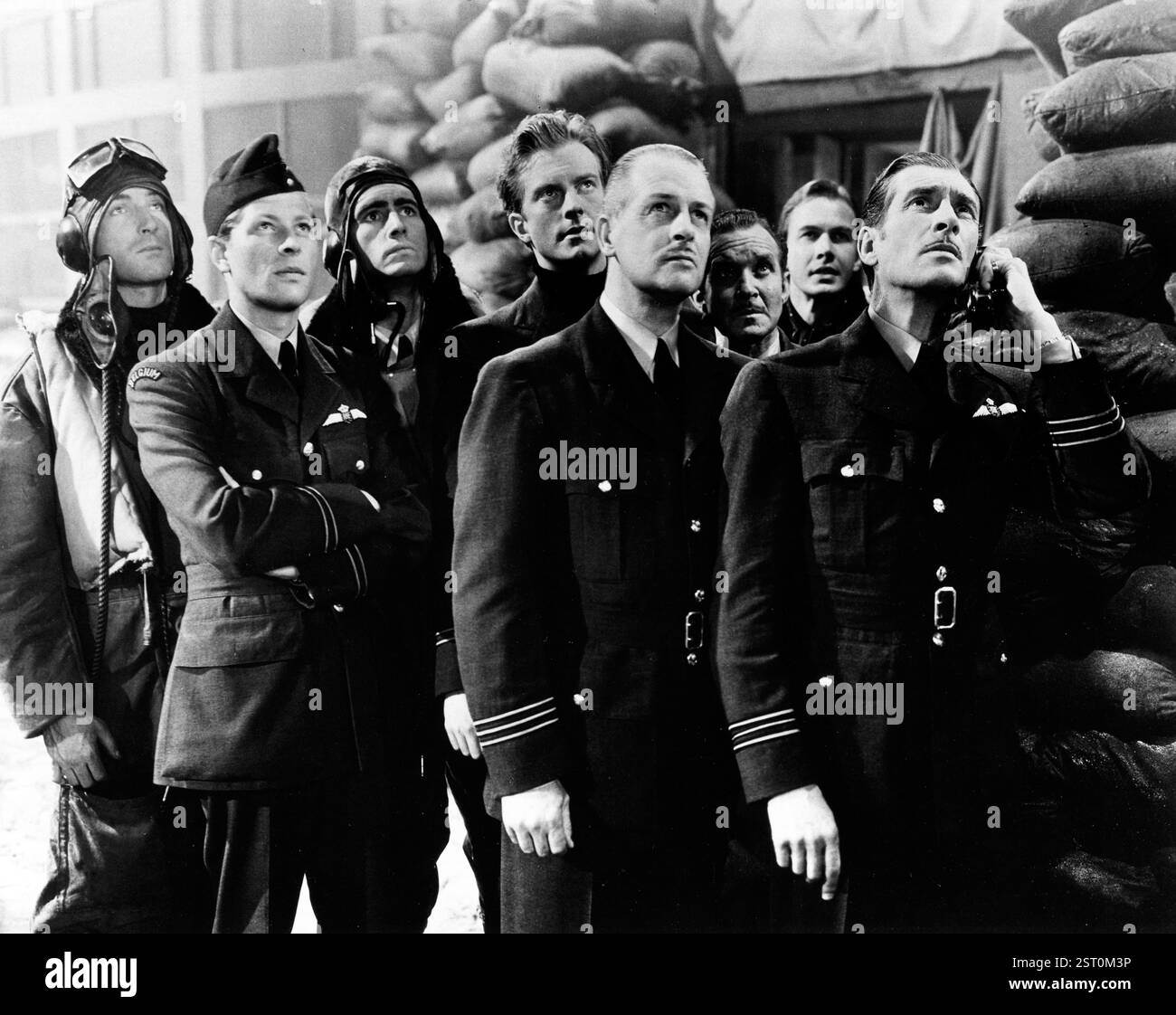 INTERNATIONAL SQUADRON [US 1941] [L-R] [?], MICHAEL AMES [arms folded], [?], WILLIAM LUNDIGAN ...