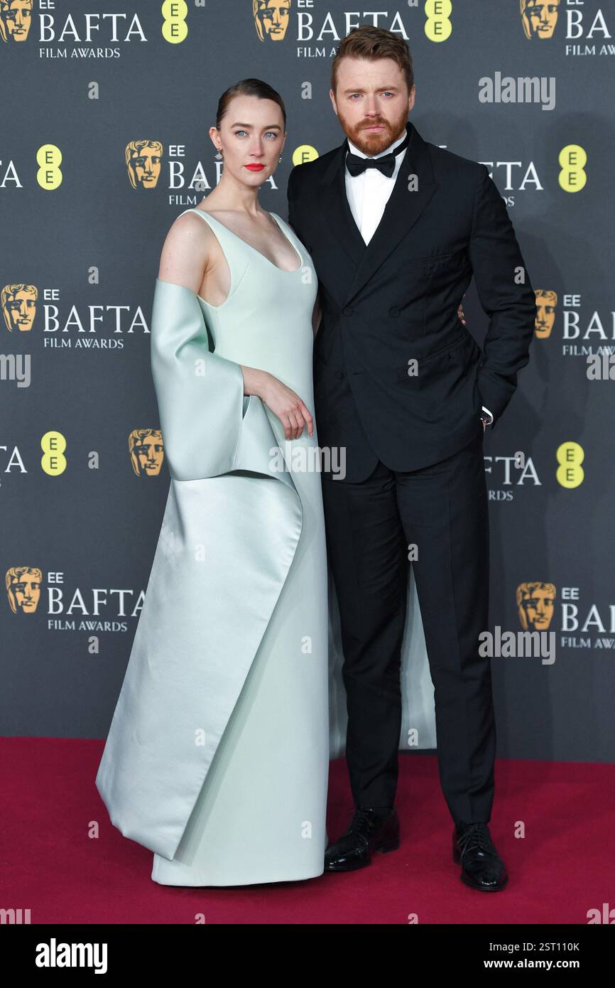 Saoirse Ronan and Jack Lowden attending the 2025 EE BAFTA Film Awards ...