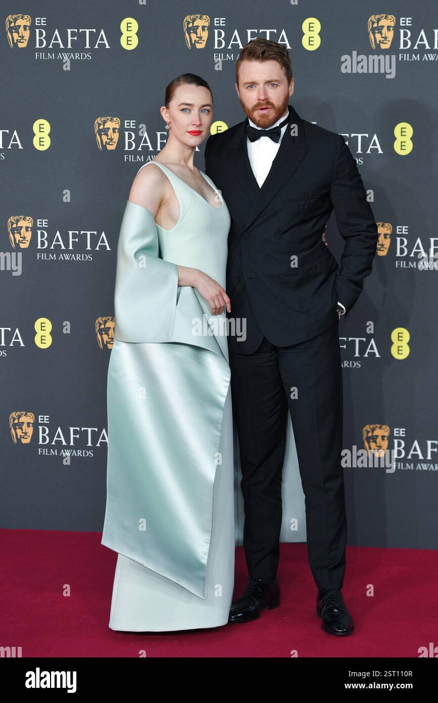 Saoirse Ronan and Jack Lowden attending the 2025 EE BAFTA Film Awards ...