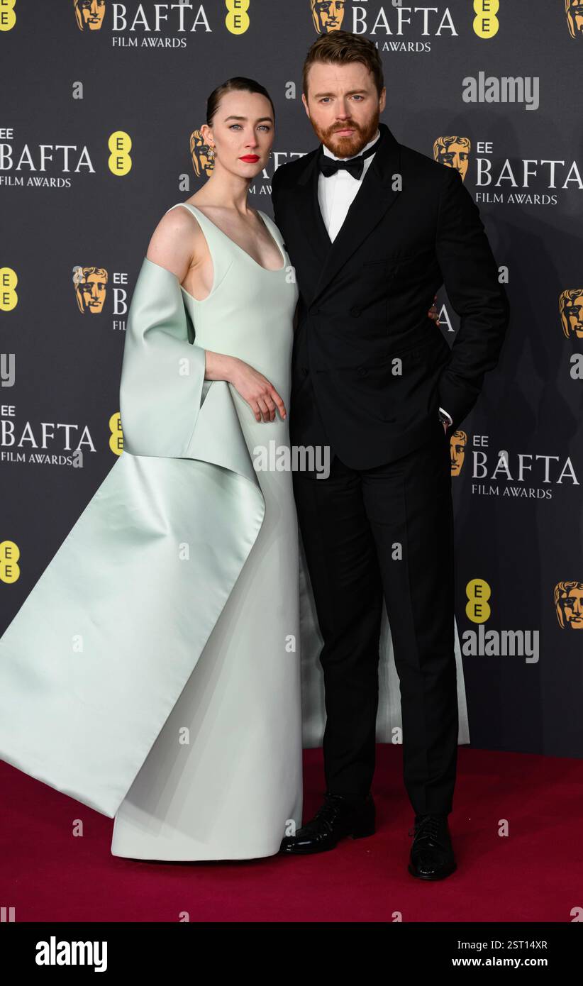 London, UK. February 16th, 2025. Saoirse Ronan and Jack Lowden arriving ...