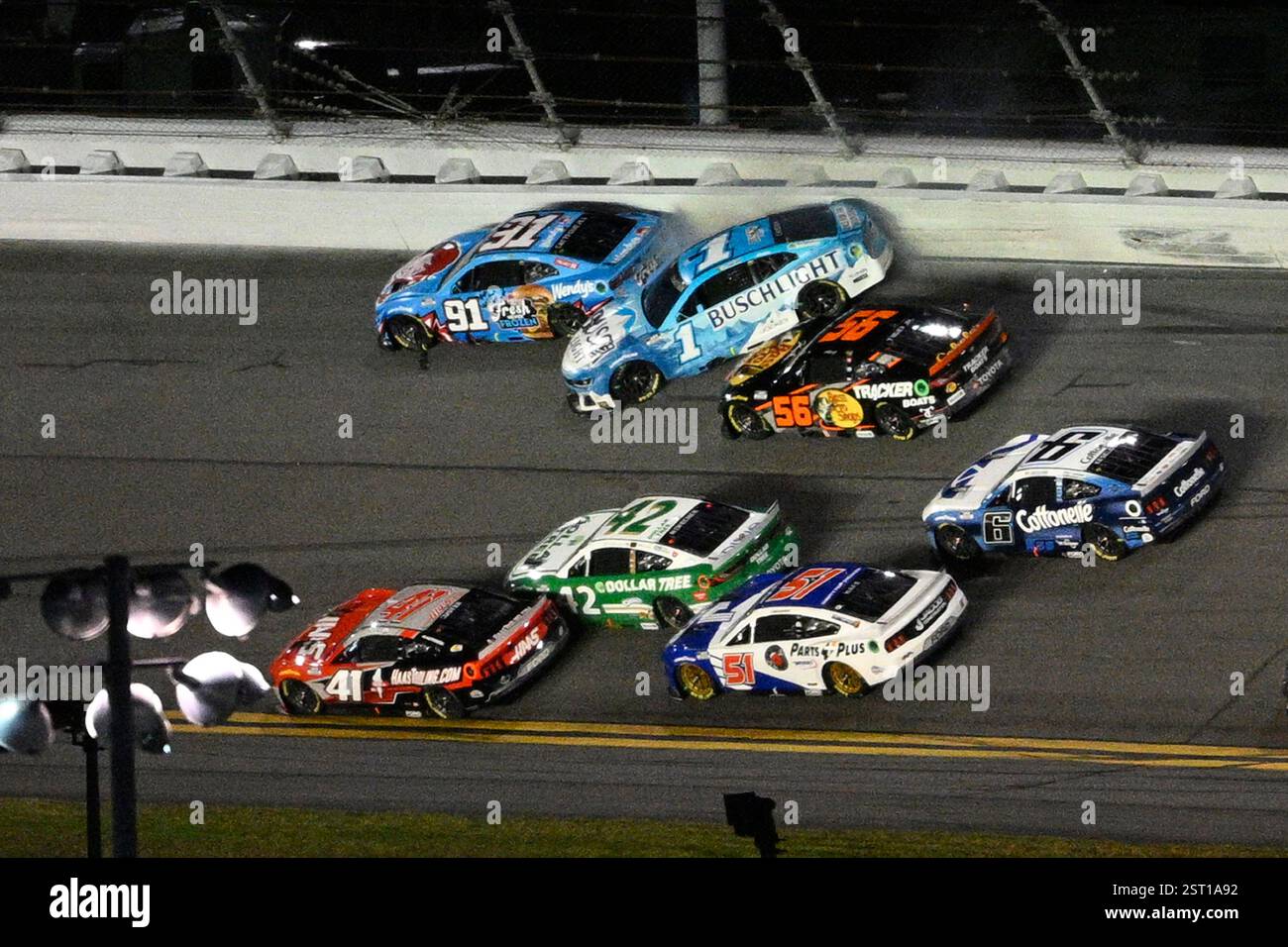 Helio Castroneves (91), Ross Chastain (1) and Martin Truex Jr. (56) get ...