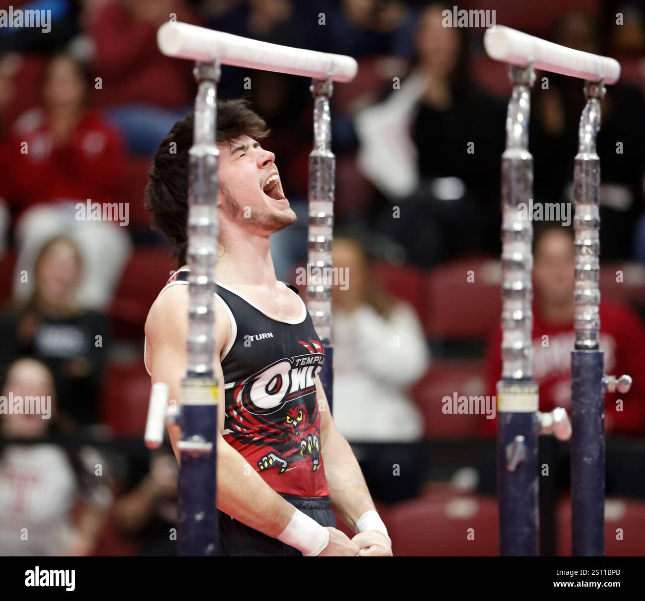 Temple Evan Zakrewski reacts after competing on the Parallel Bars ...