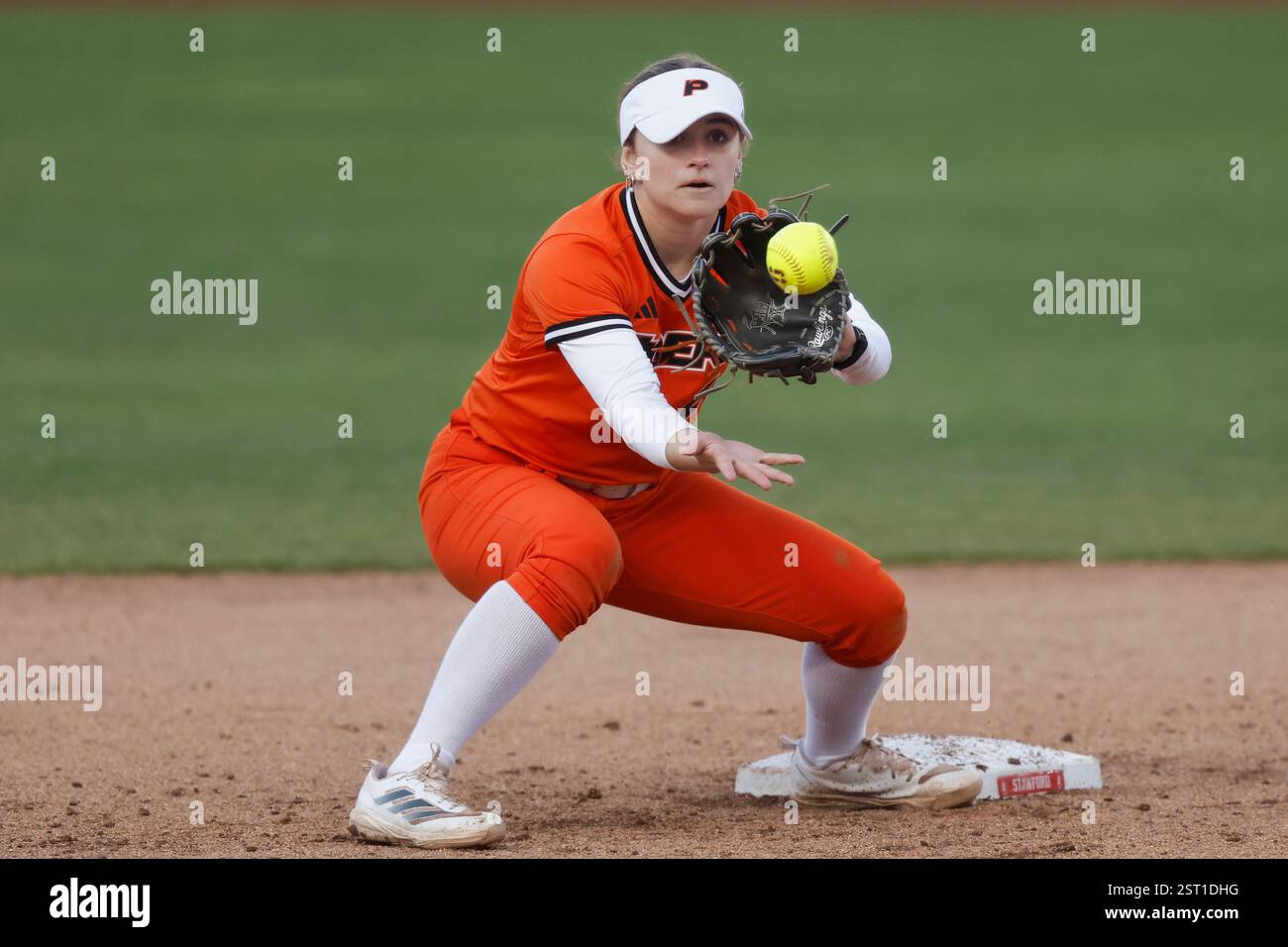 Peyton Clifford #24 of Pacific fields the ball during an NCAA softball ...