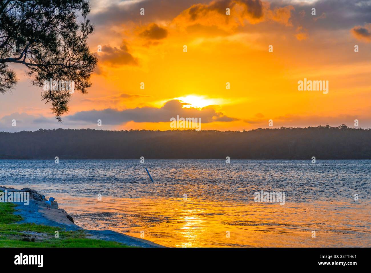 Sunset views over Wallaga Lake at the base of Gulaga Mountain, Bermagui ...
