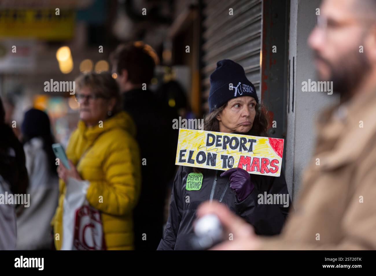 Seattle, Washington, USA. 16th February 2025. A woman holds a sign ...