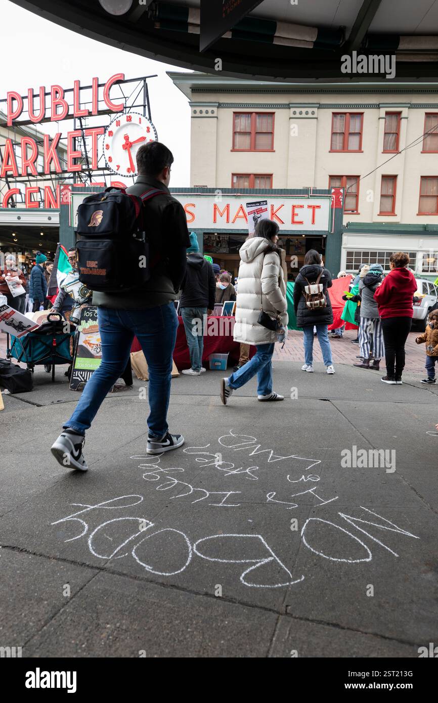 Seattle, Washington, USA. 16th February 2025. A tourist walks over a ...