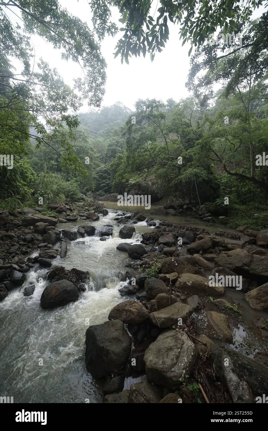 The river is rocky and the water is murky Stock Photo - Alamy