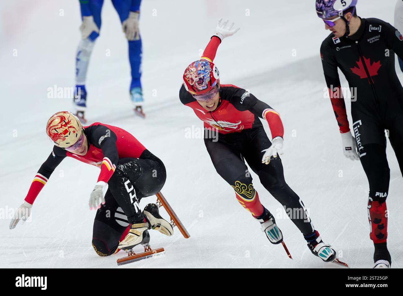 Milan, Italy. 16th Feb, 2025. China's Sun Long (C) and Liu Shaoang compete during the men's ...