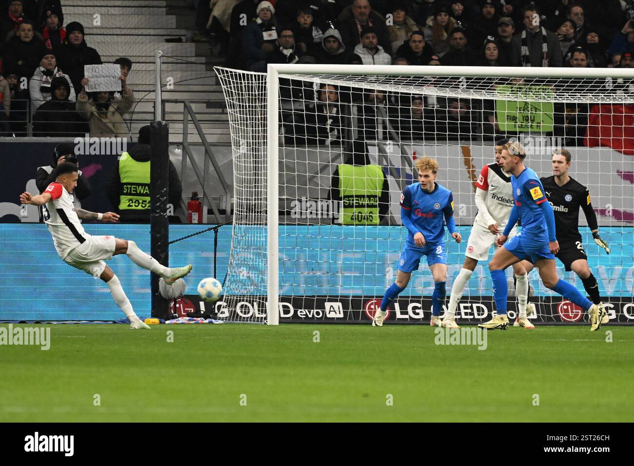 Frankfurt, Germany. 16th Feb, 2025. Lucas Tuta (1st L) of Eintracht ...