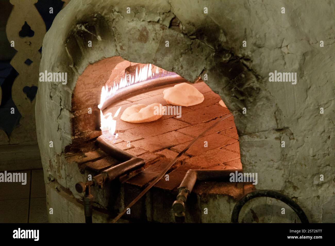 State of Qatar. Doha. Traditional bread baking Stock Photo - Alamy