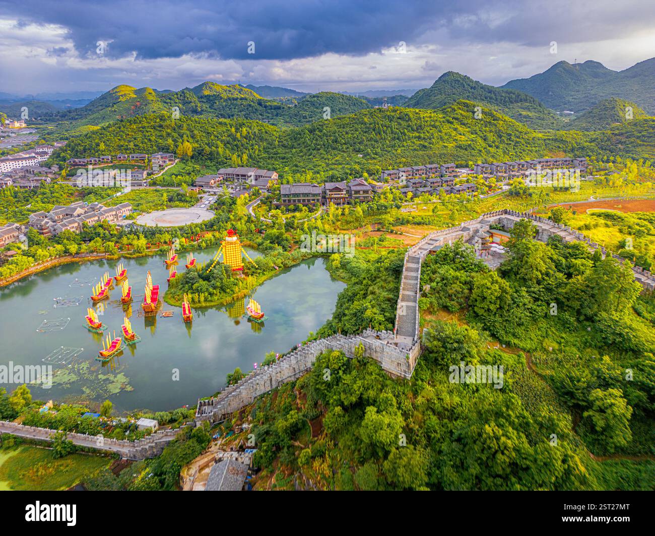 The pond with ships and streets of Qingyan Ancient Town, one of the top ...
