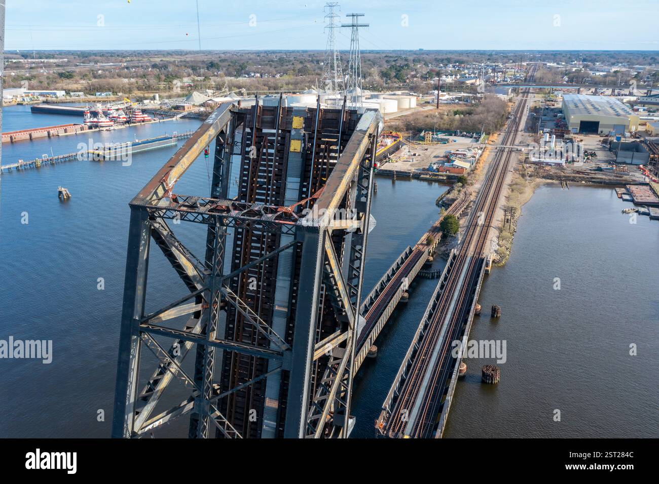 Aerial view of a railroad Draw bridge in the vertical lift position ...
