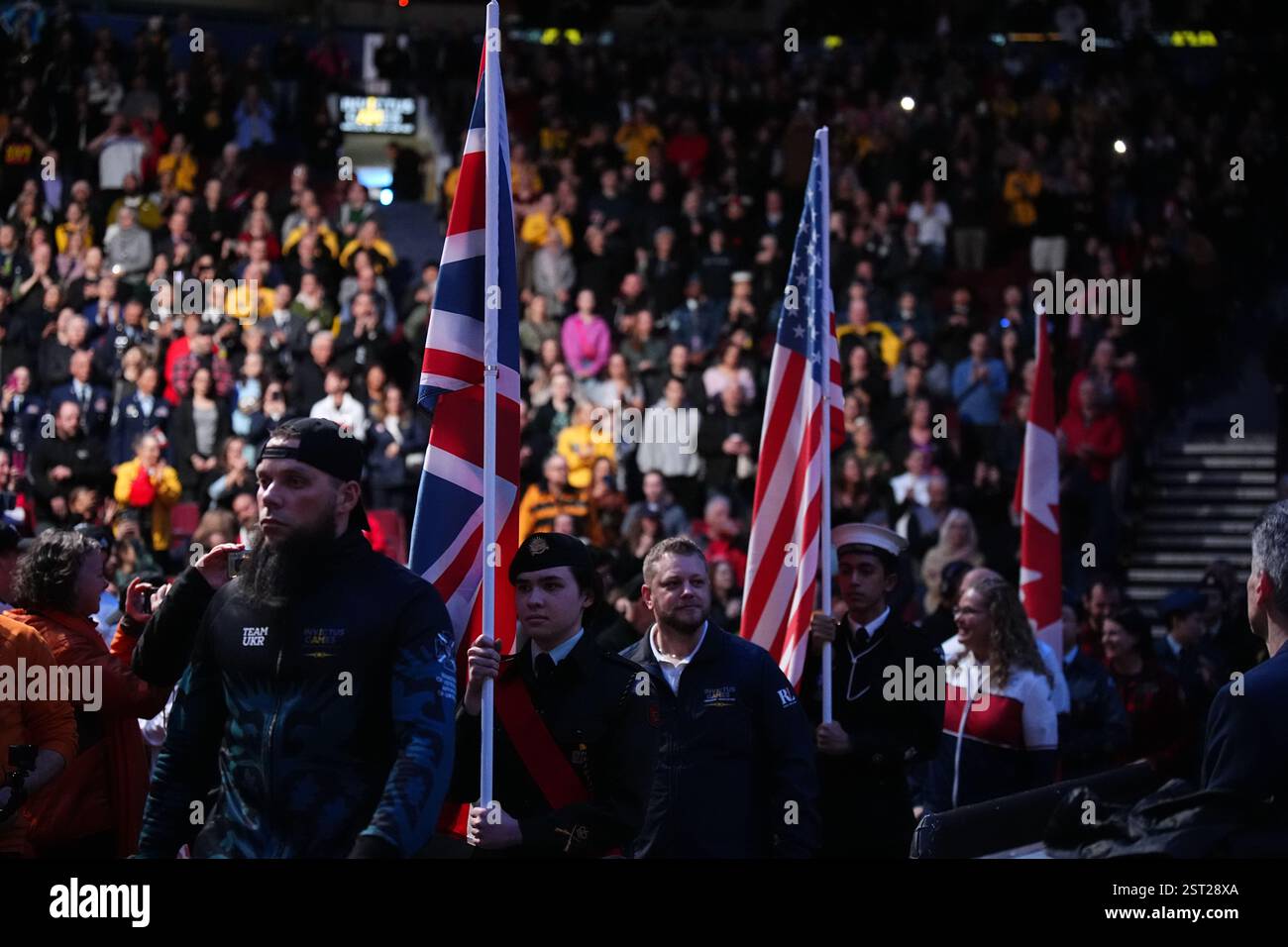 A flag parade during the Closing Ceremony of the 2025 Invictus Games ...