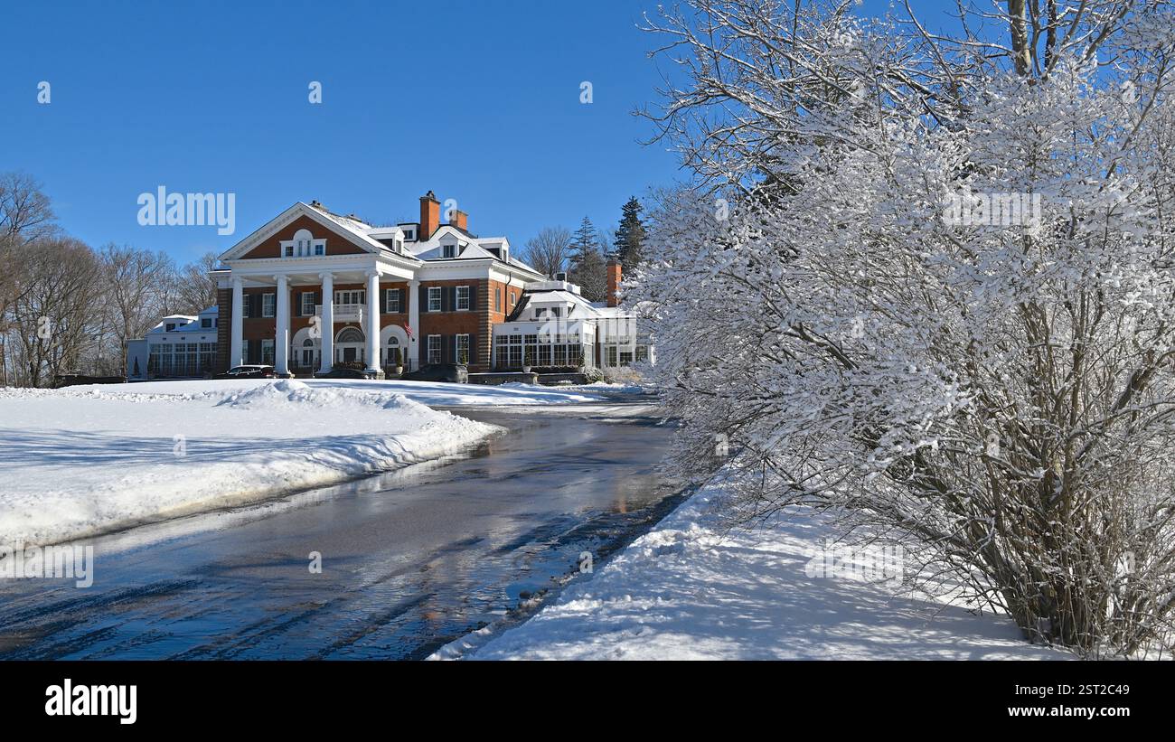 Building exterior of a mansion after a heavy snow storm Stock Photo - Alamy