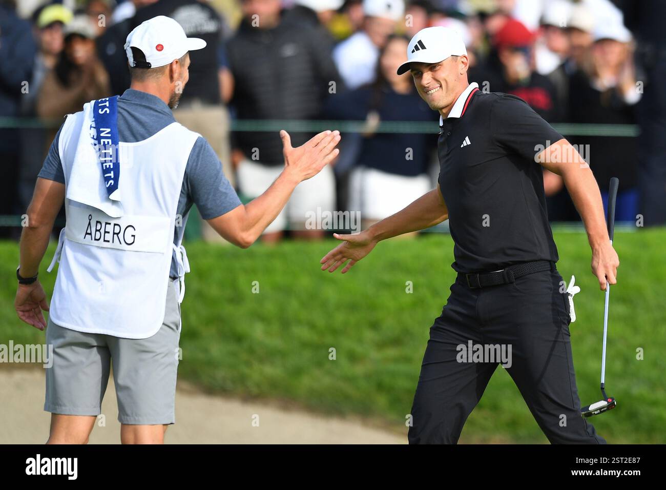 LA JOLLA, CA - FEBRUARY 16: Ludvig Aberg celebrates with his caddie Joe ...