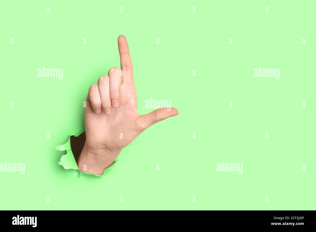 Woman making loser gesture hand hi-res stock photography and images - Alamy
