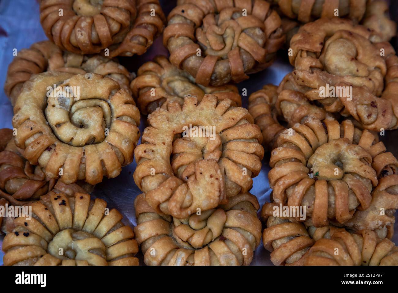A traditional handmade cake of Bangladesh, known as 'Pitha ...