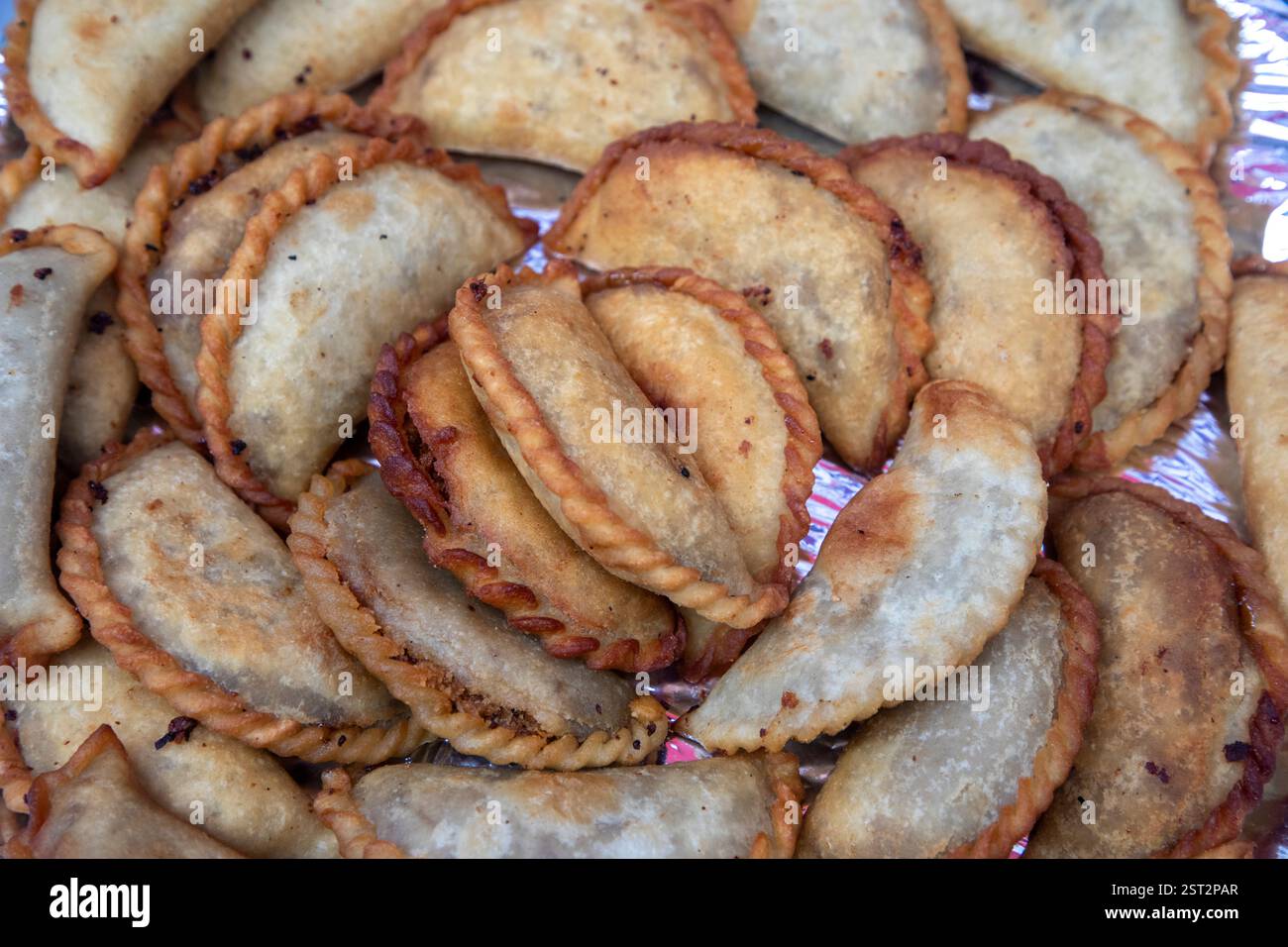 A traditional handmade cake of Bangladesh, known as 'Pitha ...