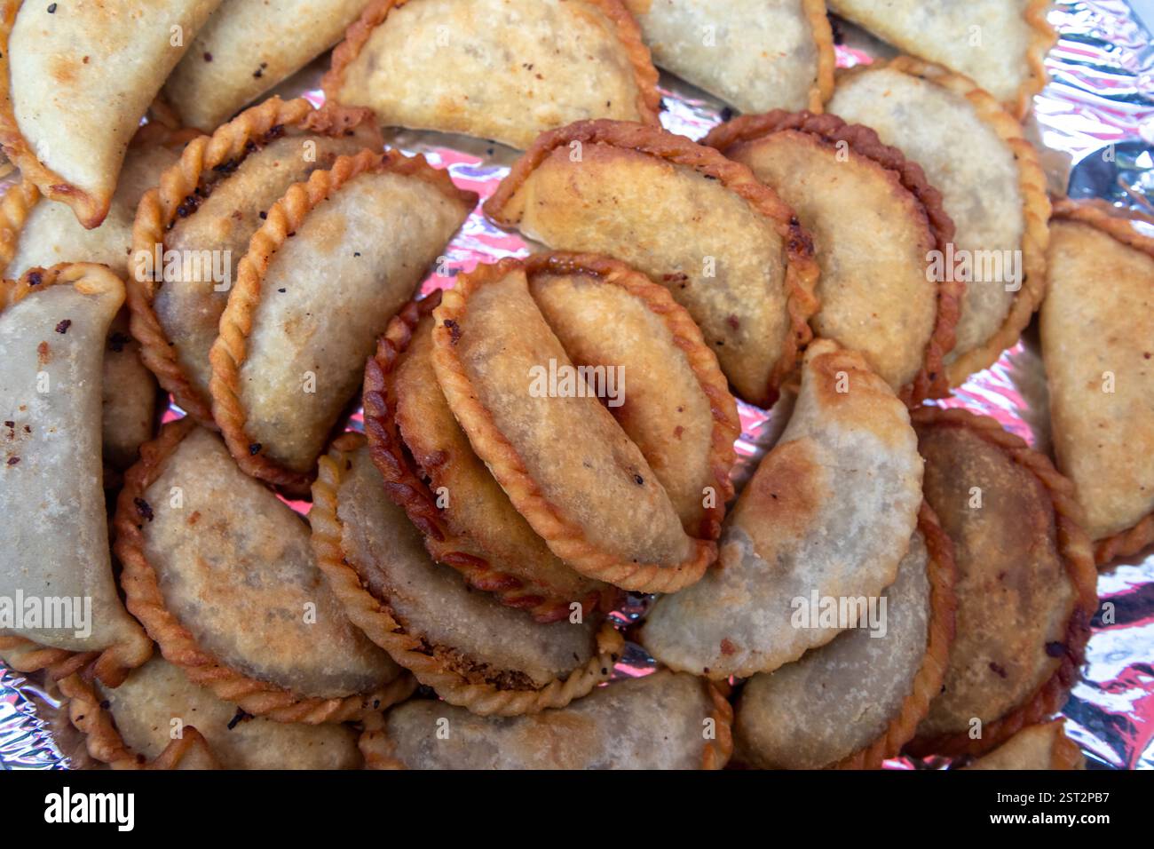 A traditional handmade cake of Bangladesh, known as 'Pitha ...