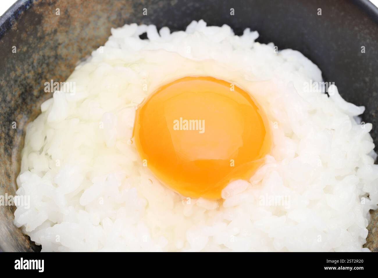 Japanese cooked white rice with raw egg, It is called Tamagokake Gohan ...