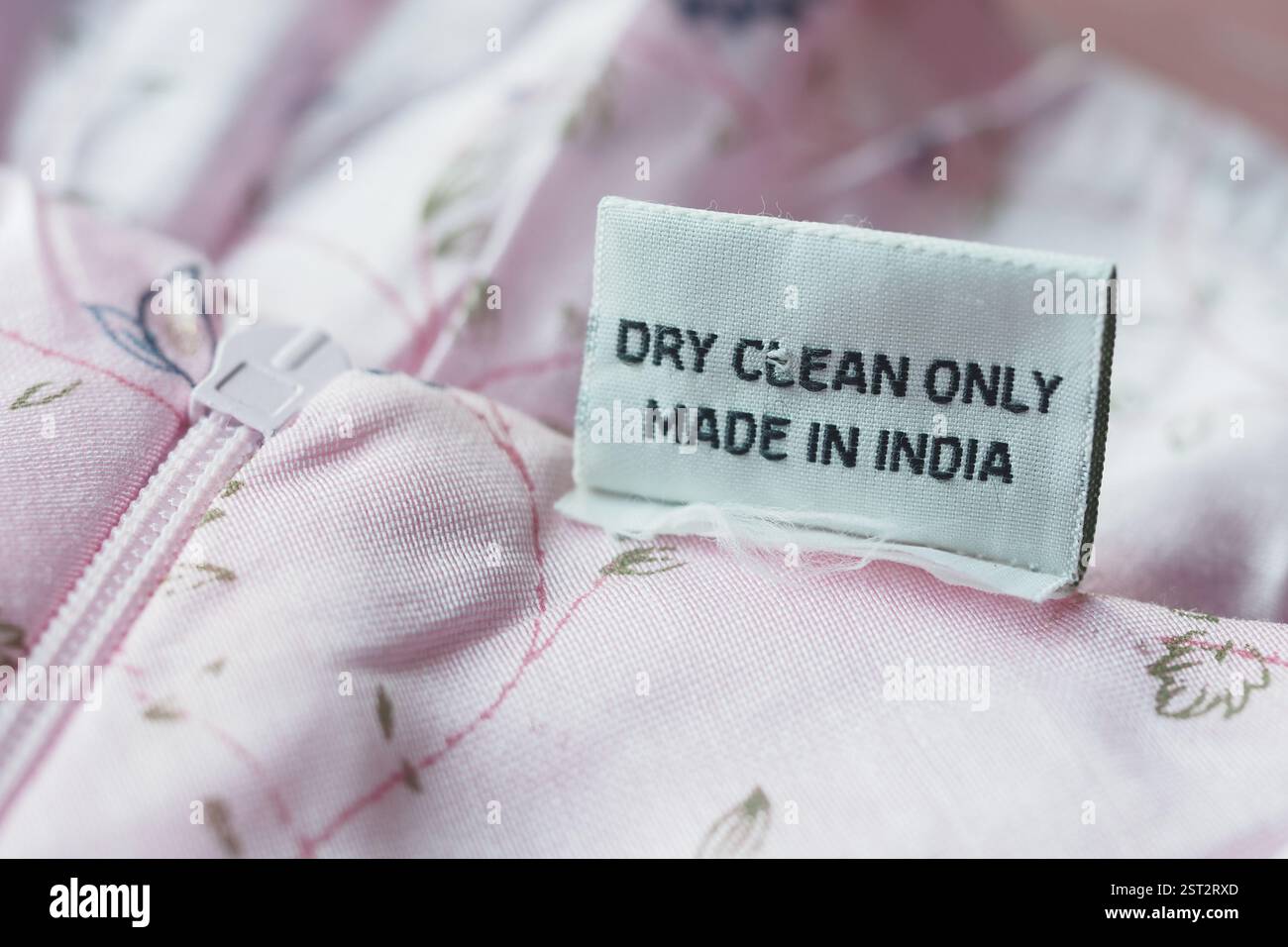 Clothing label displaying care instructions and origin details Stock ...