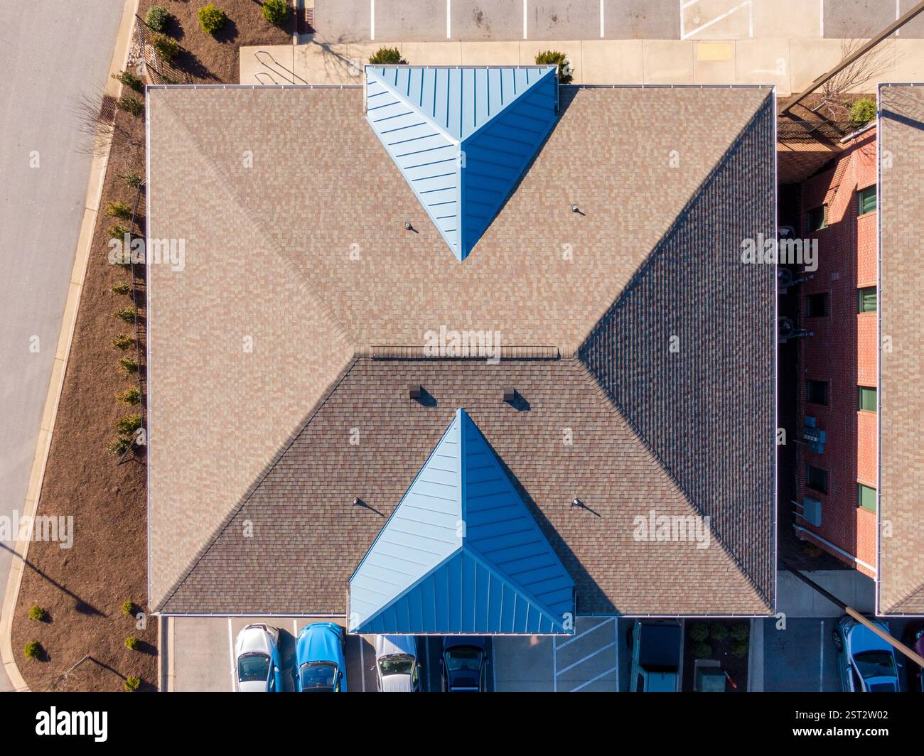 Day Time Drone Images of a Commercial Building With An Asphalt Shingle ...