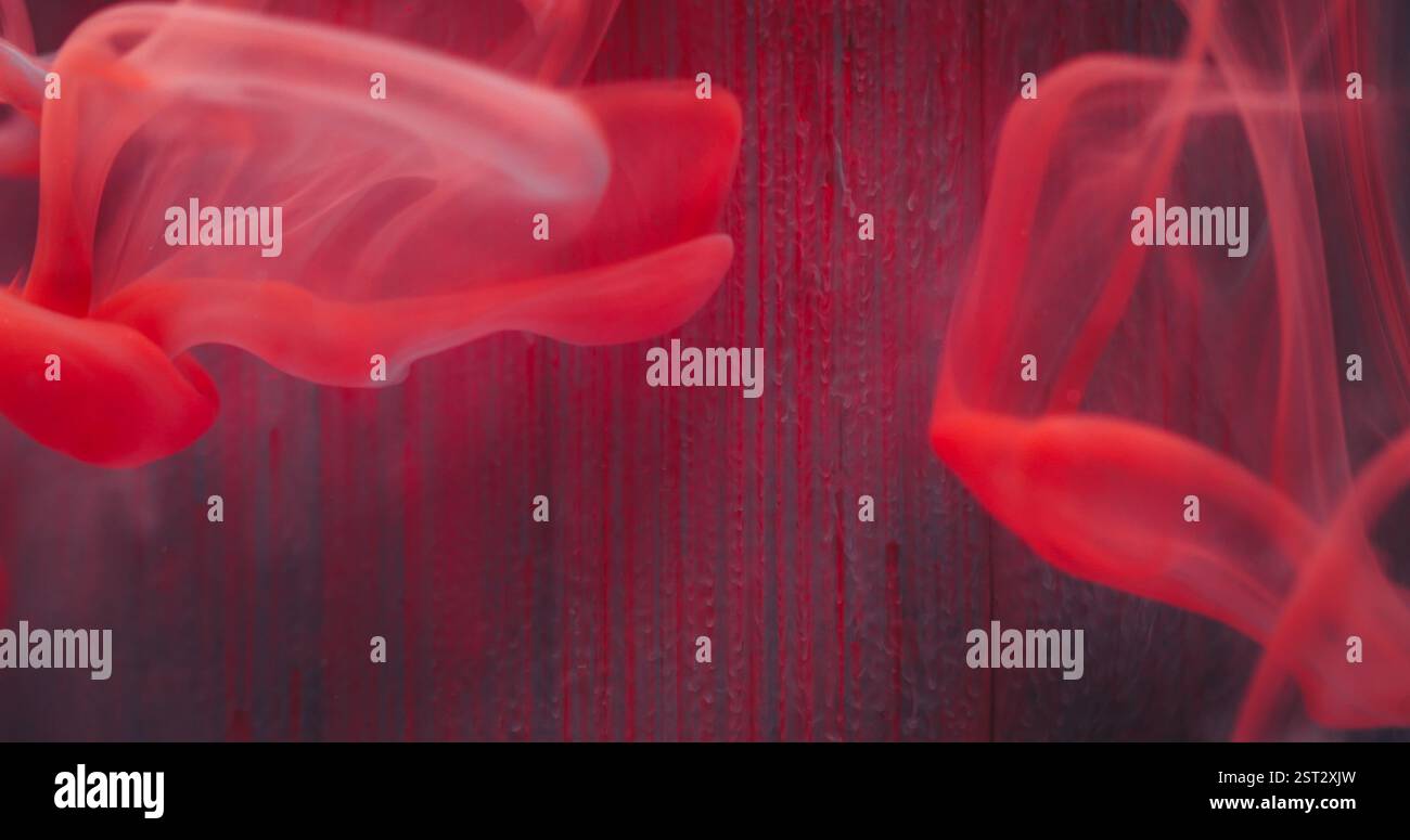 Blur liquid emulsion. Paint water texture. Defocused red color shine ...