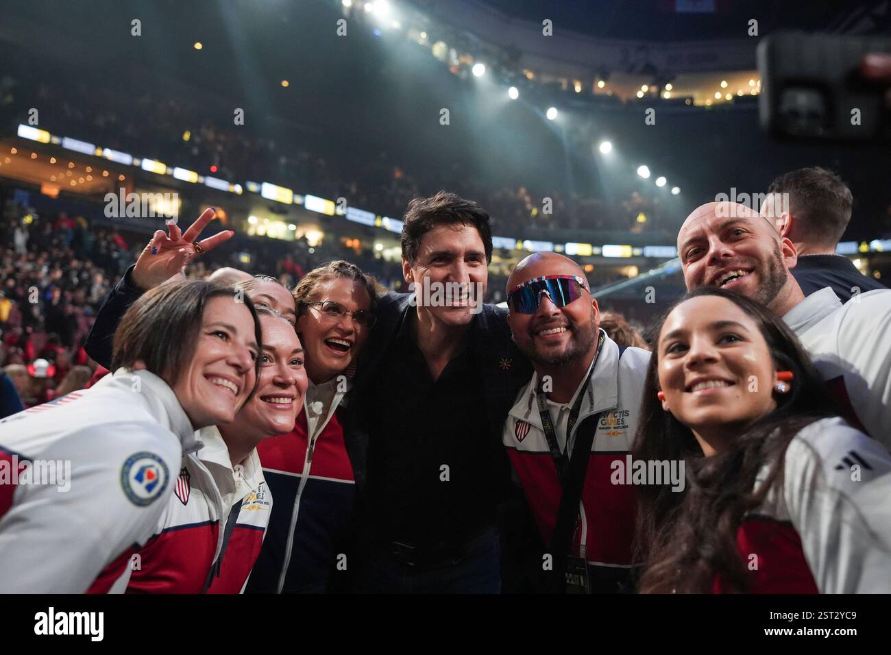 Canadian Prime Minister Justin Trudeau poses with U.S. athletes after ...