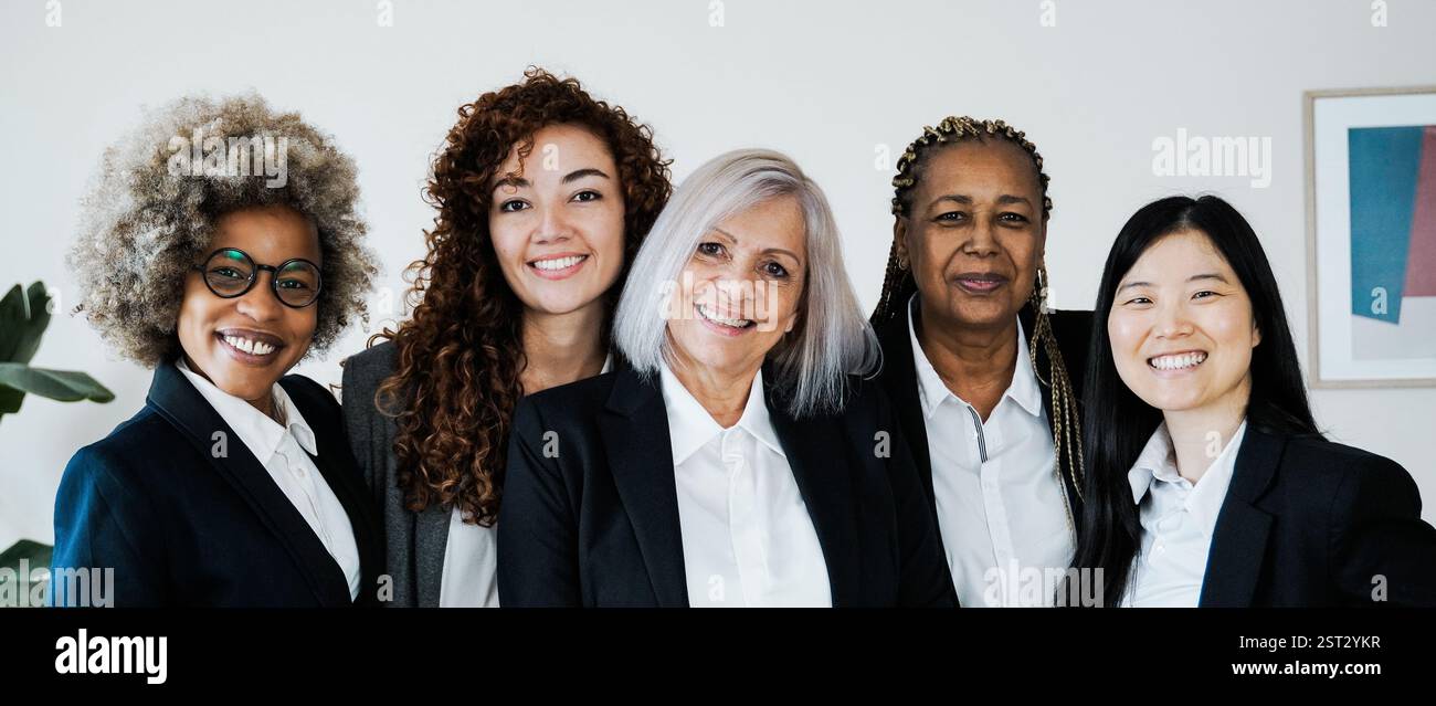 Diverse business women smiling on camera inside bank office. Female ...