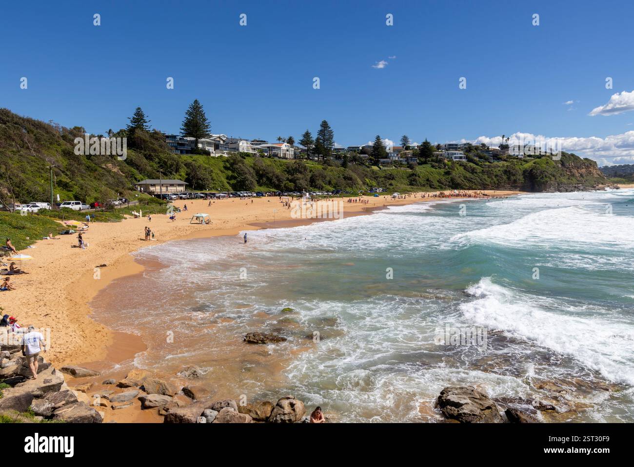 Warriewood Beach in Sydney Australia, summers day with people relaxing ...