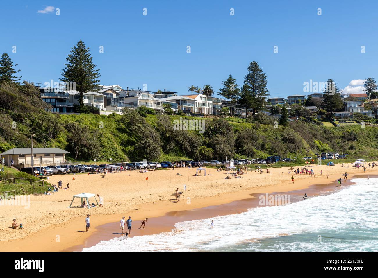 Warriewood Beach in Sydney Australia, summers day with people relaxing ...