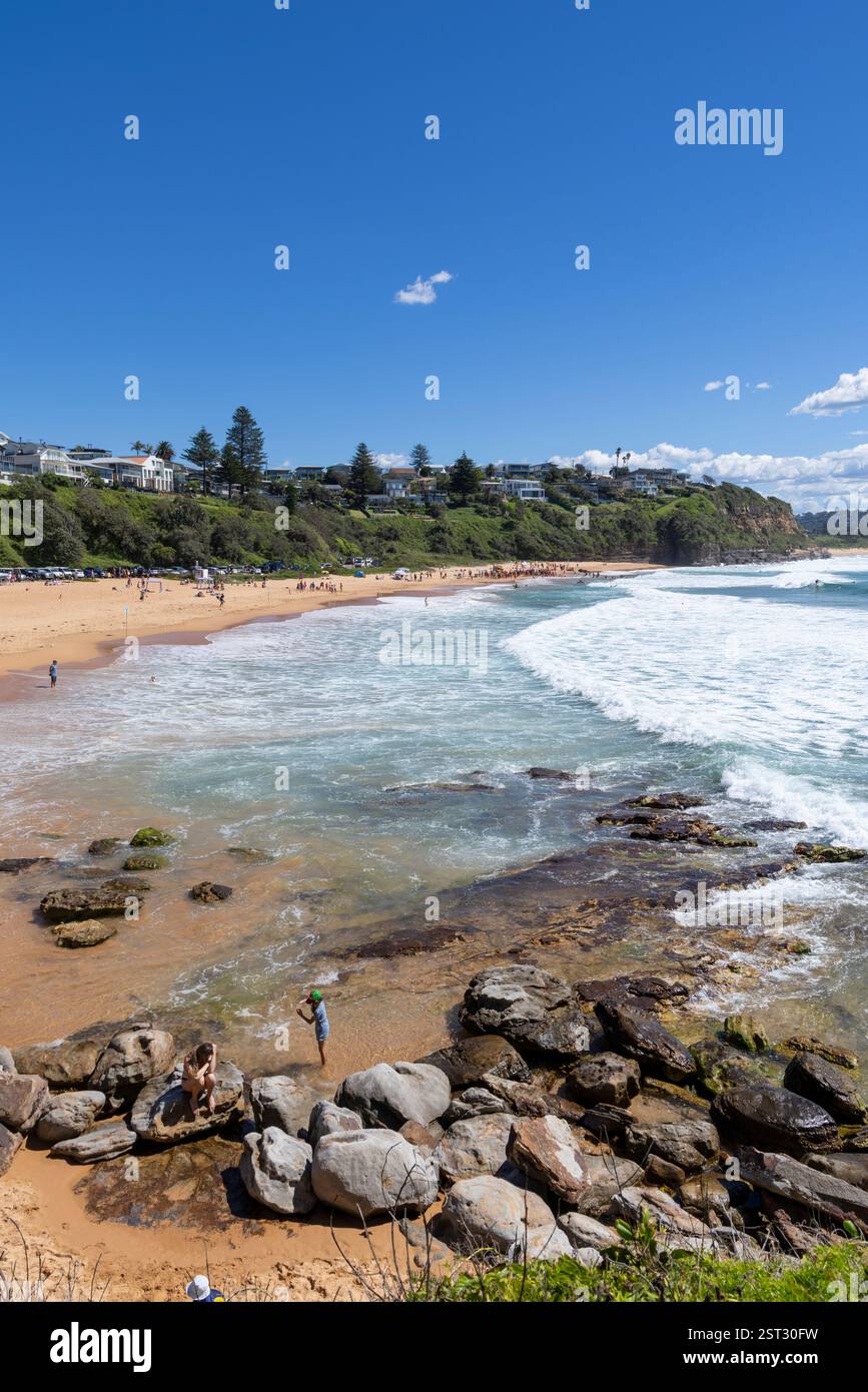 Warriewood Beach in Sydney Australia, summers day with people relaxing ...