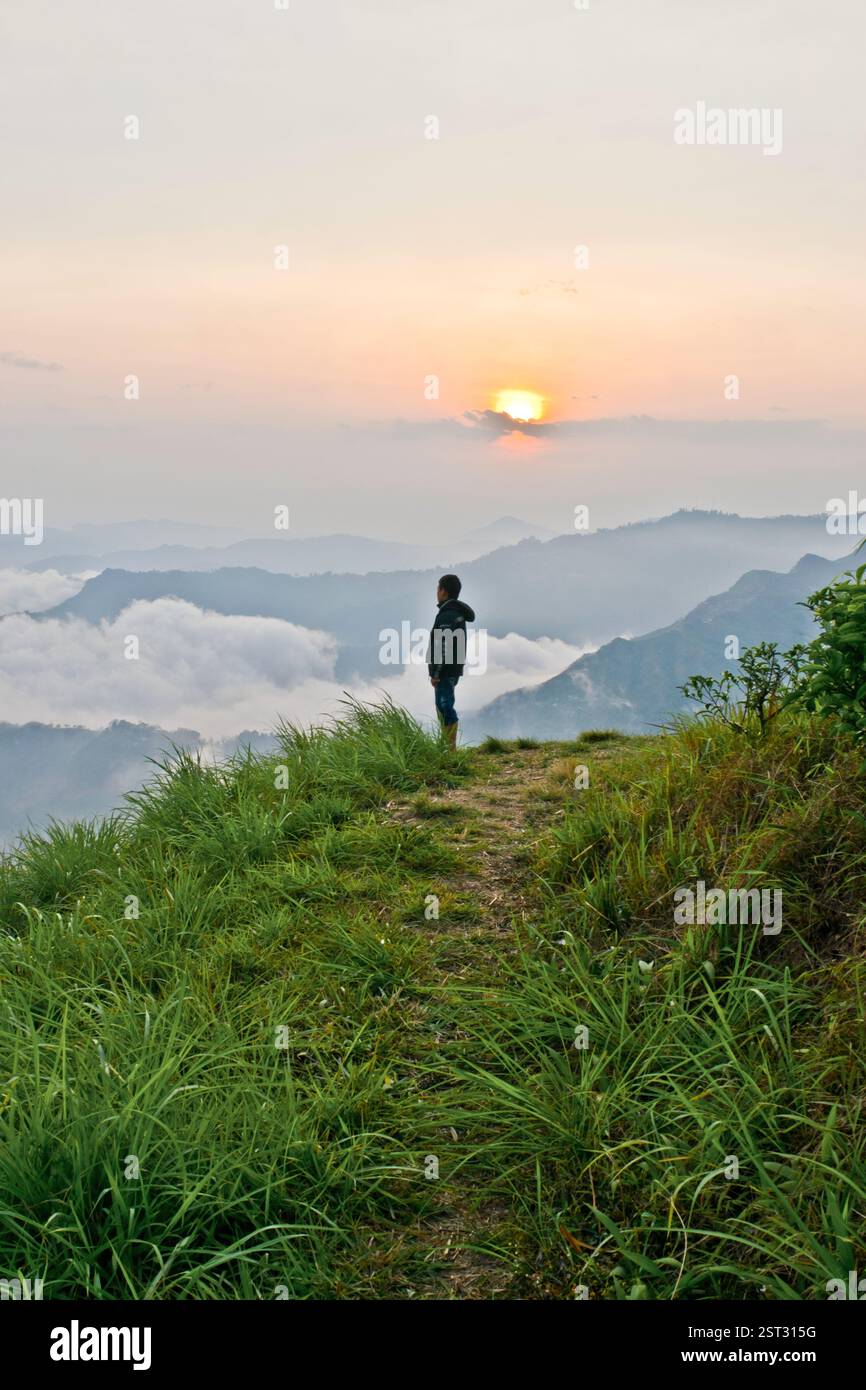 "A little soul, lost in the colors of the sky, watches the sunset from ...