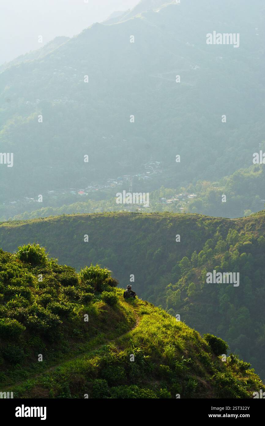 Pensive hiker sitting on hi-res stock photography and images - Alamy