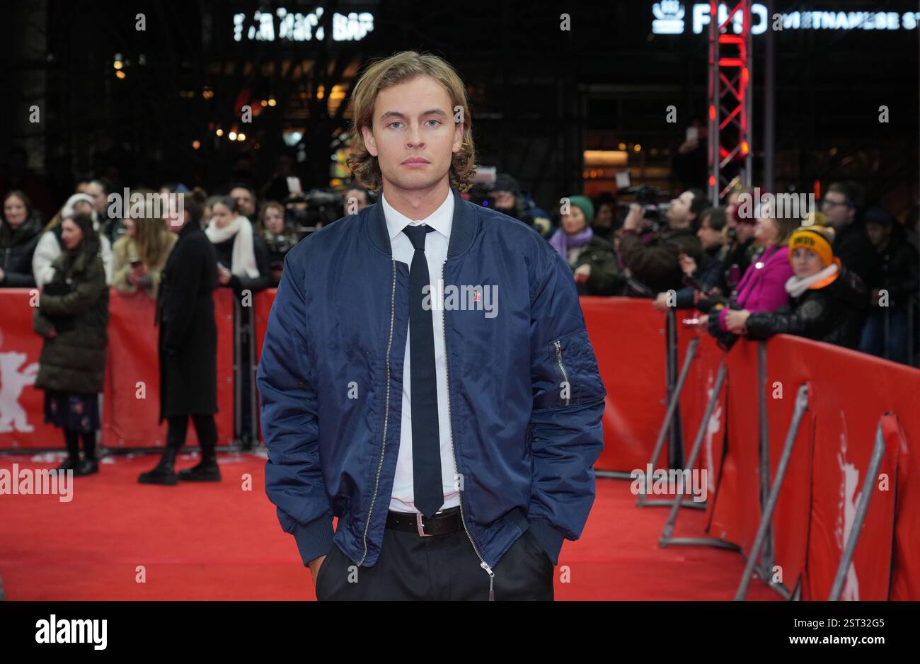 Berlin, Germany. 15th Feb, 2025. Actor William Lodder stands on the red ...