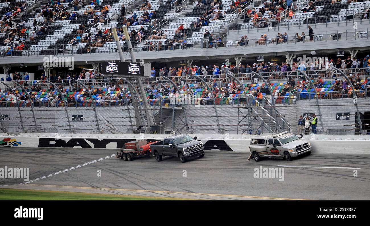 DAYTONA BEACH, FL - FEBRUARY 16: Jet dryers dry the track during a rain ...