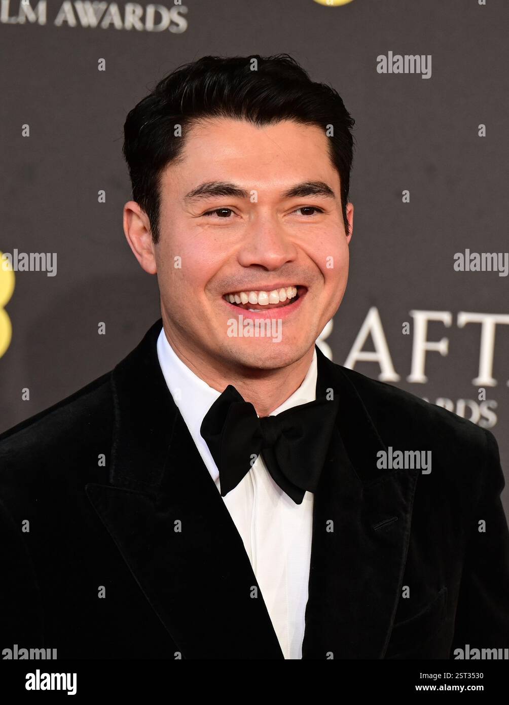 LONDON, UK. 16th Feb, 2025. Henry Golding at EE BAFTA Film Awards 2025 ...