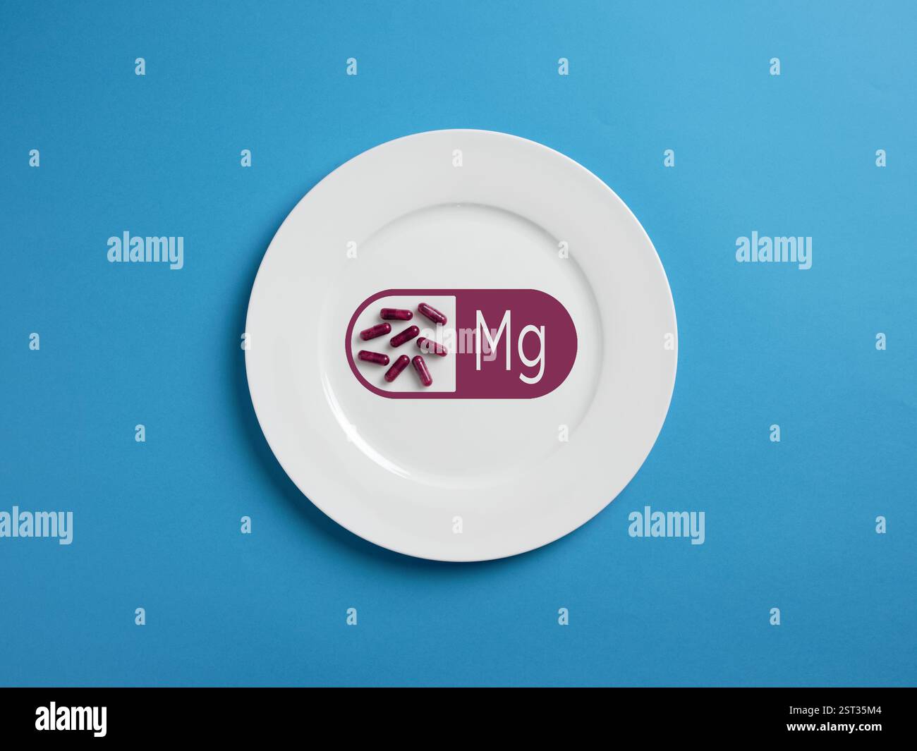 Magnesium supplement pills replacing food on a plate, representing the ...