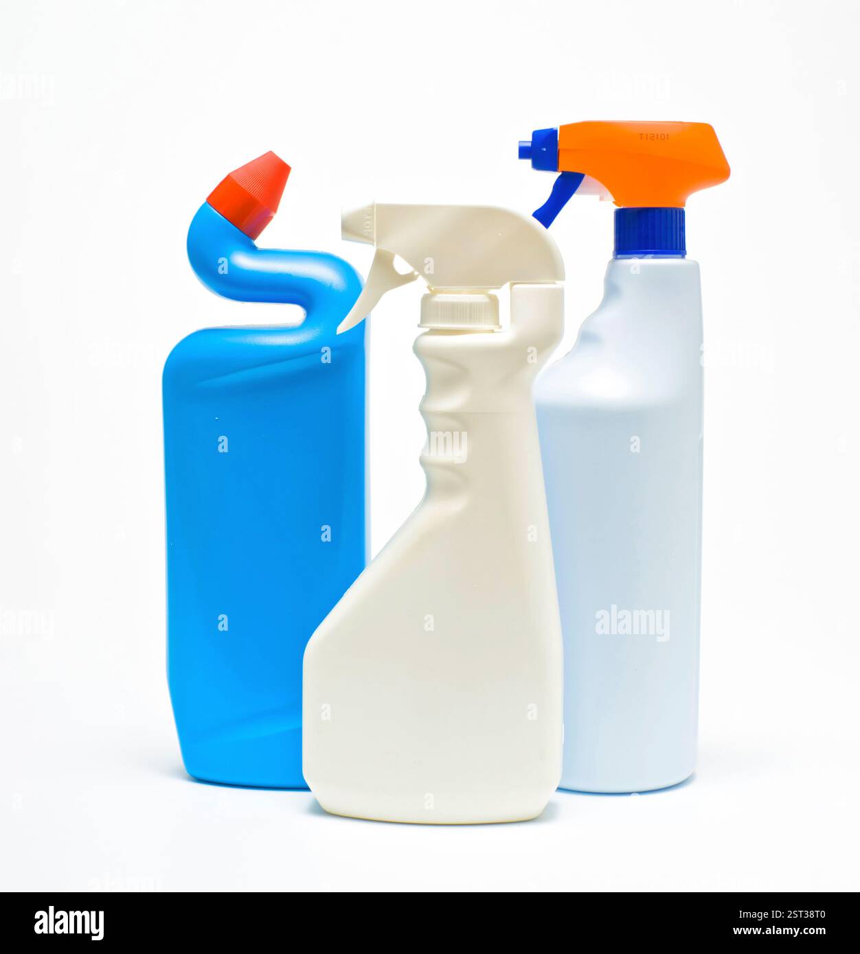 Three plastic bottles for cleaning solutions are arranged neatly. The ...