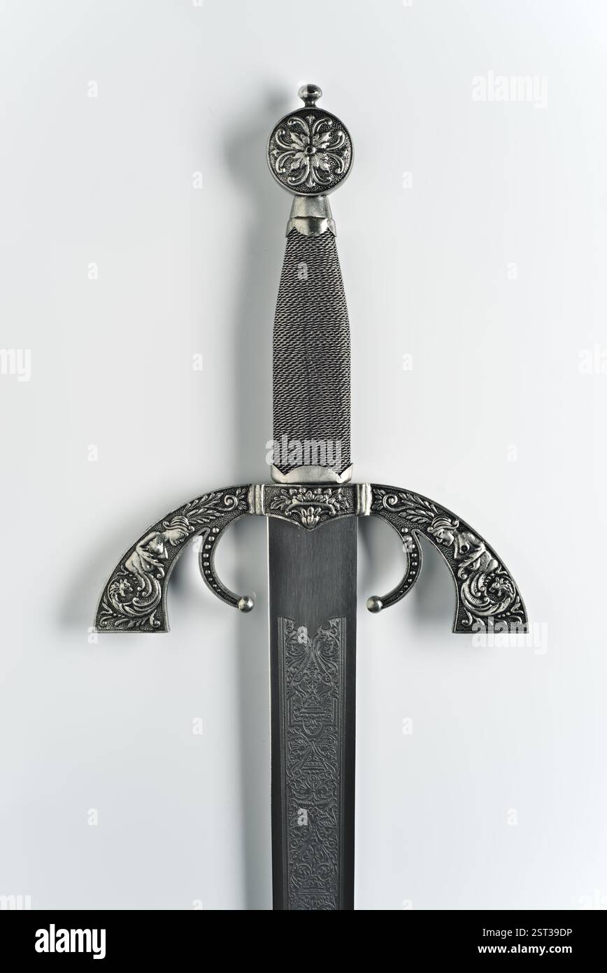 This Toledo steel sword displays remarkable detail, featuring ornate ...