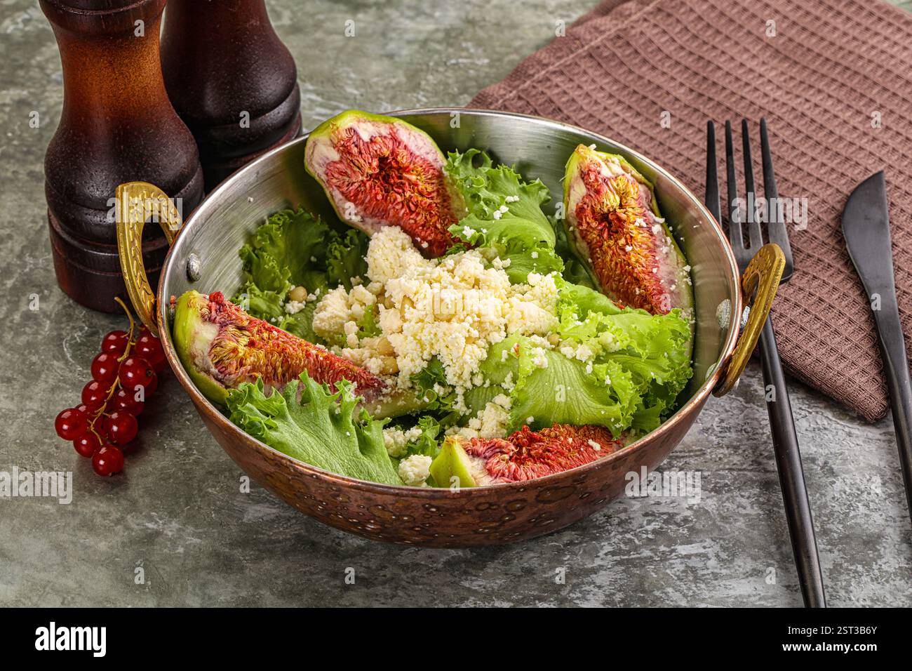 Salad with fig and sheep cottage cheese Stock Photo - Alamy
