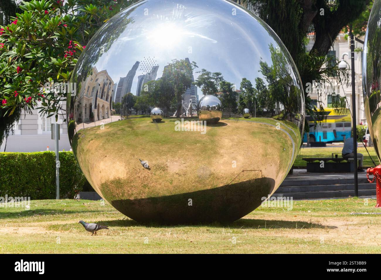 24 Hours in Singapore by artist Baet Yeok Kuan. A round reflective ...