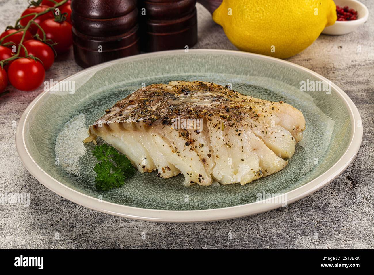 Dietary Baked cod fish fillet with spices Stock Photo - Alamy