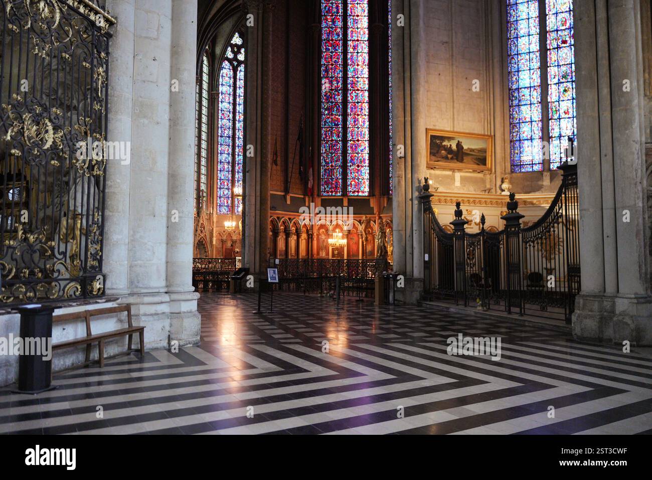 View of Amiens Cathedral showcasing vibrant stained glass windows ...