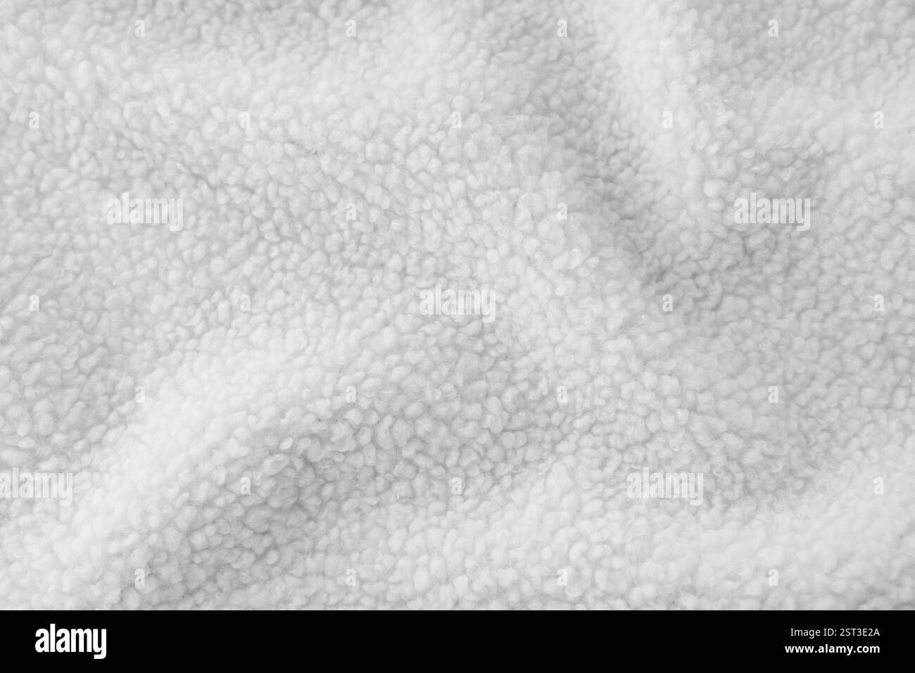 Soft and cozy white sherpa fleece fabric made from recycled polyester ...